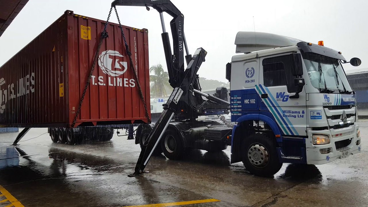 40ft Shipping Container Offload - Rain or Sunshine work carries on ...