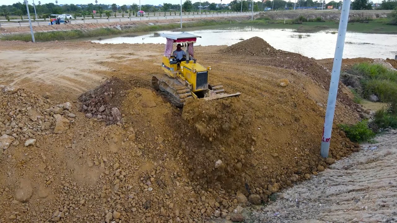 Excellent Techniques Bulldozer Push Soil and Dump Truck Unloading Soil ...