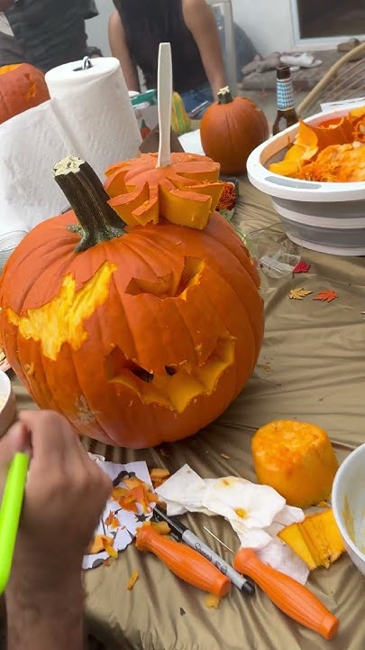 Pumpkin carving battle! Who carved better?🤓 watch us turn these ...