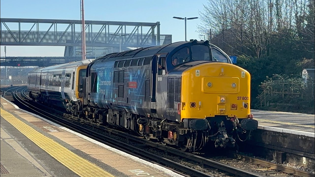 Rail Operations Group class 37 800 drags class 466 037 looking in a sorry state through ...