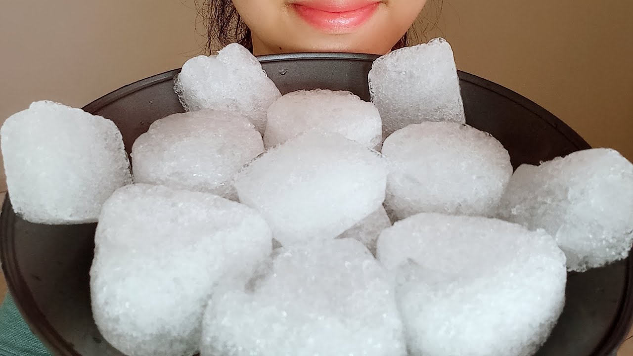 Shaved ice slushy ice to make rice balls, round and small square ice ...