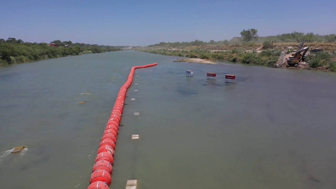 Drone footage of buoys along Texas border in Eagle Pass - YouTube