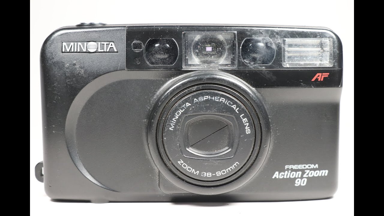 Minolta Action Zoom 90 35mm Film Point-And-Shoot Camera Being Checked ...