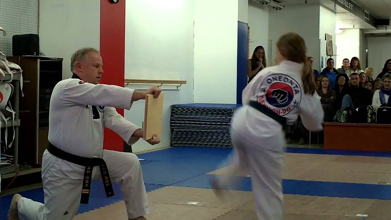 Maeve breaks 2 boards with lead leg side kick - YouTube