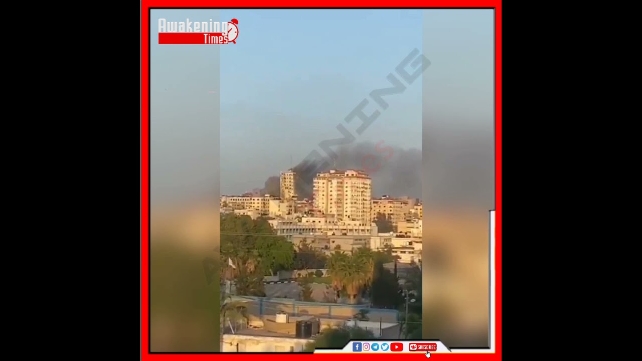 Israeli warplanes blow up and destroy the Al-Shorouq Tower in #Gaza ...