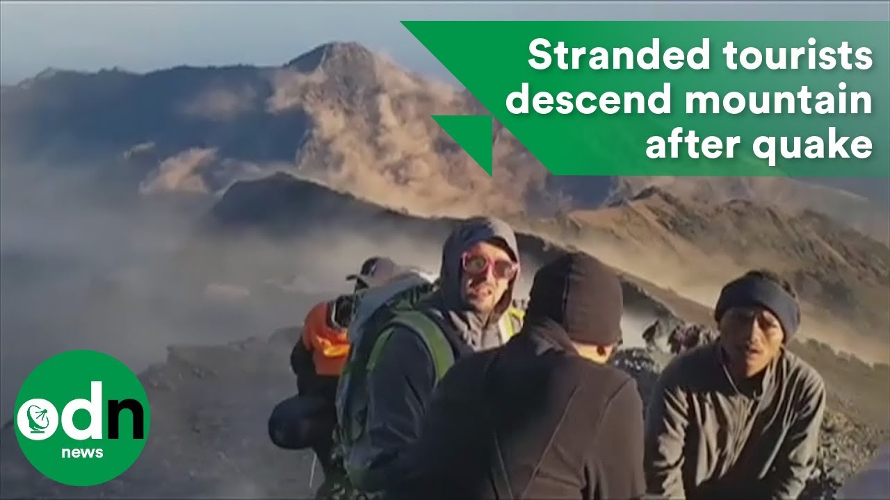 Stranded tourists descend mountain after quake - YouTube