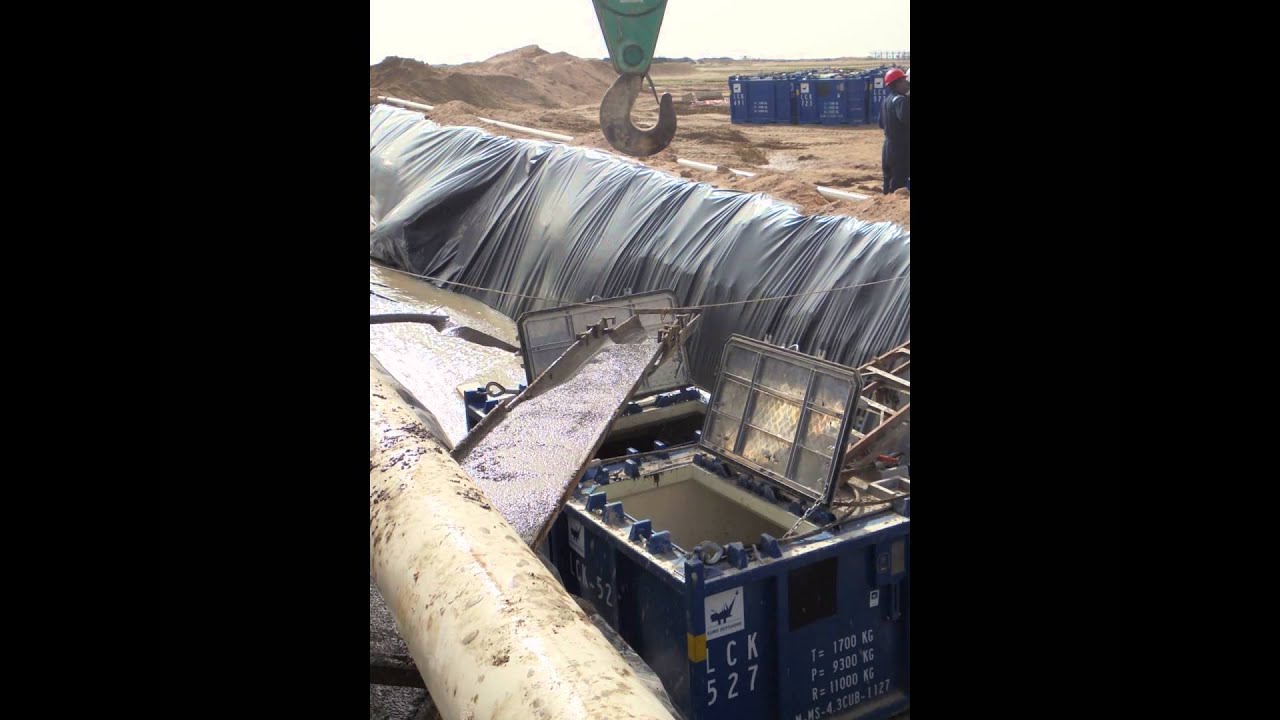 Drill Cuttings filling into Skips - YouTube