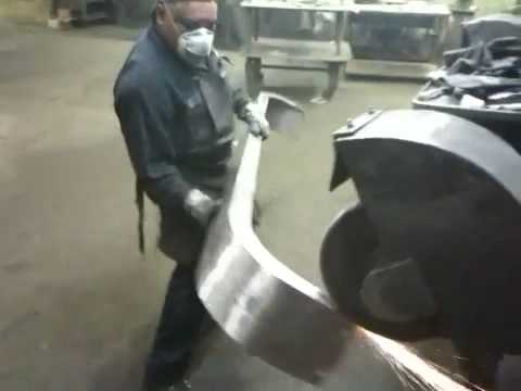 Bus bumper on polishing wheel - YouTube