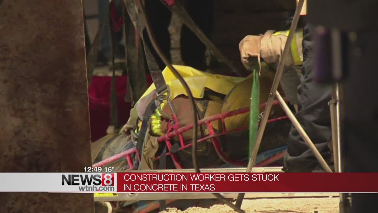 San Antonio crews rescue man stuck in pit with concrete mix - YouTube