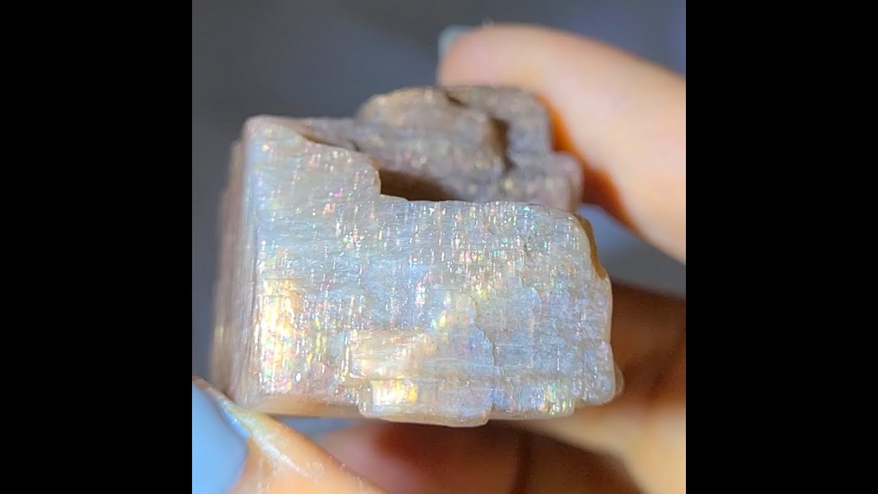 Raw rainbow meteor shower sunstone from Tanzania - SM280 - YouTube