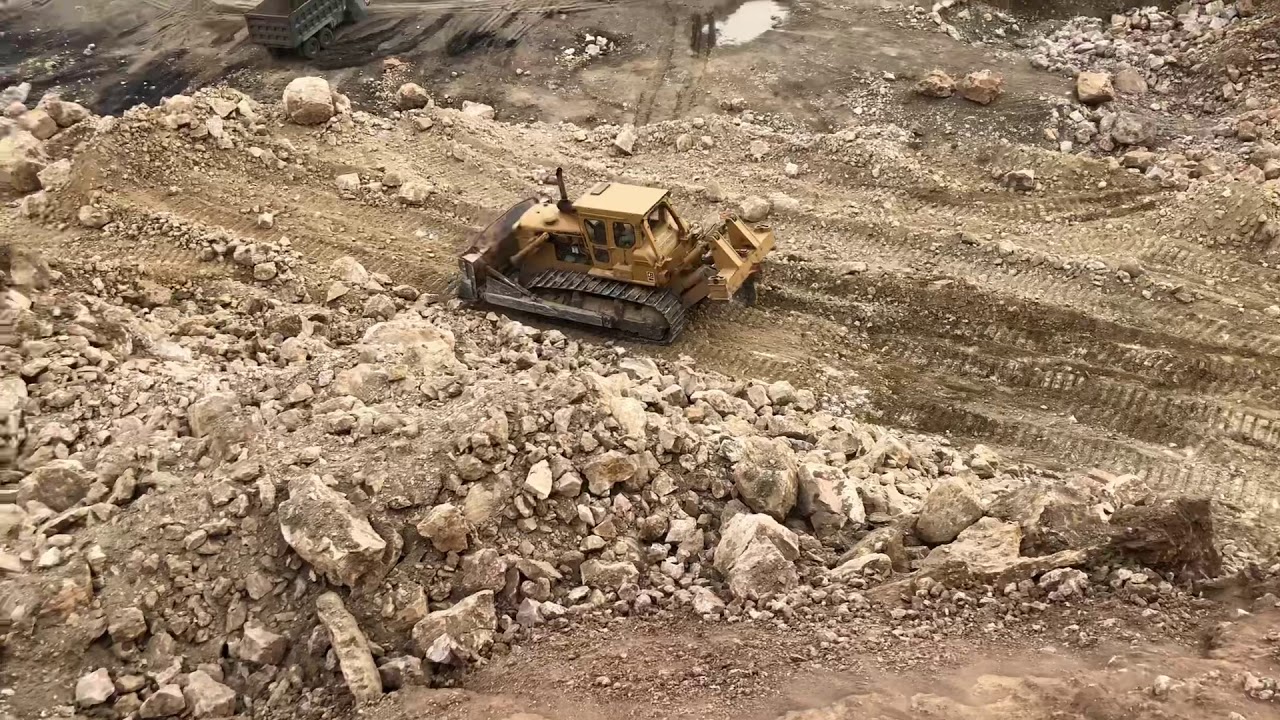 Old CAT dozer working on Quarry - YouTube