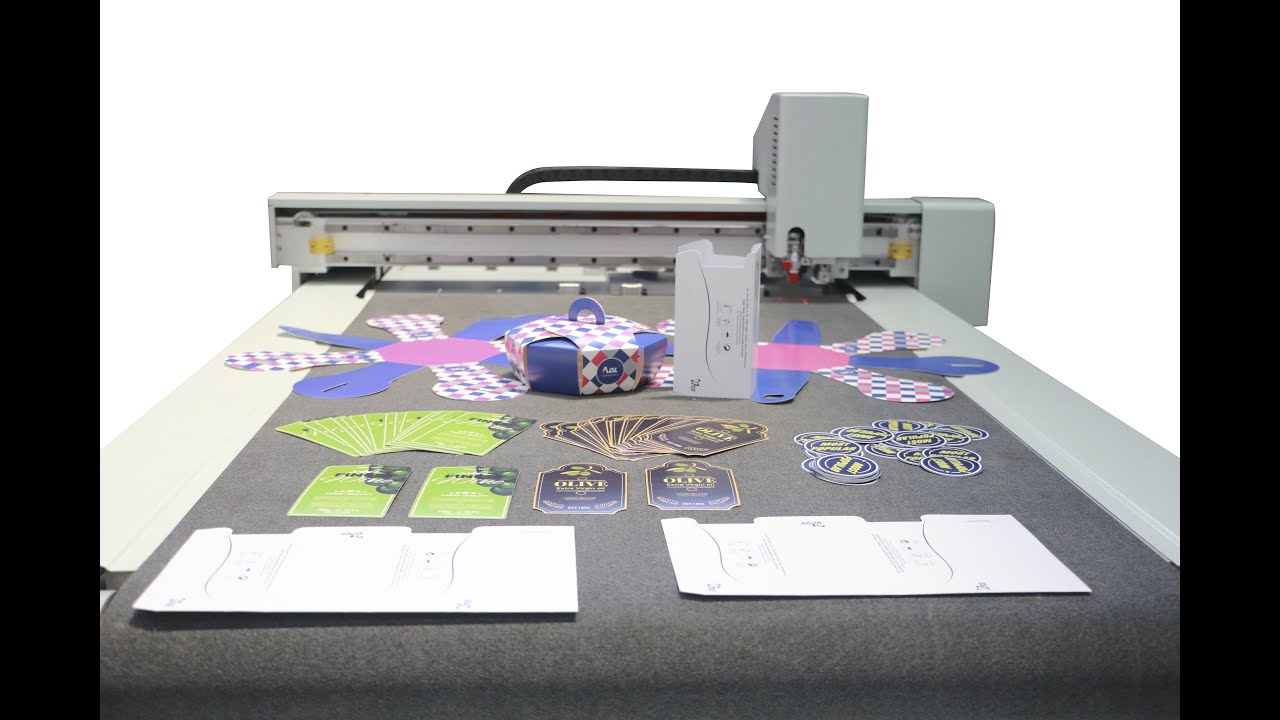 Automatic digital cutting plotter for sticker folding carton - YouTube