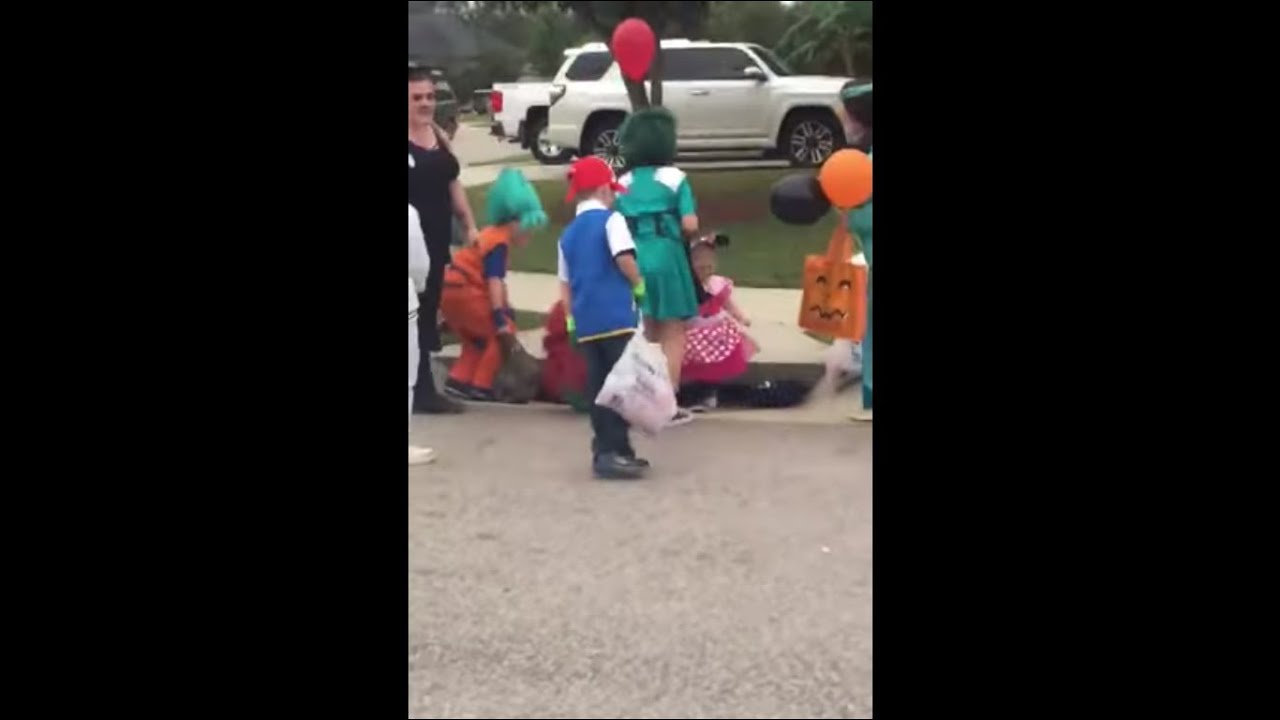 Clown Hides In The Street Gutter With A Candy Bowl Beside Him For The ...