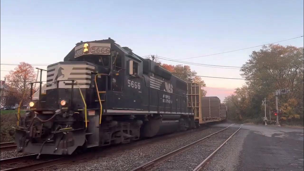 NS 5666 GP38-2 leads CR MA01 with a friendly crew at Piscataway,Nj - YouTube
