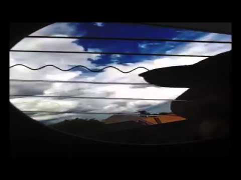 Unique footage of oscillating strings from inside guitar - YouTube