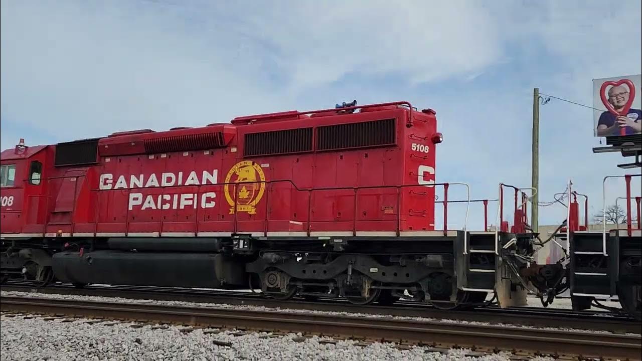 BNSF with CP and a KCS as a mid DPU - YouTube