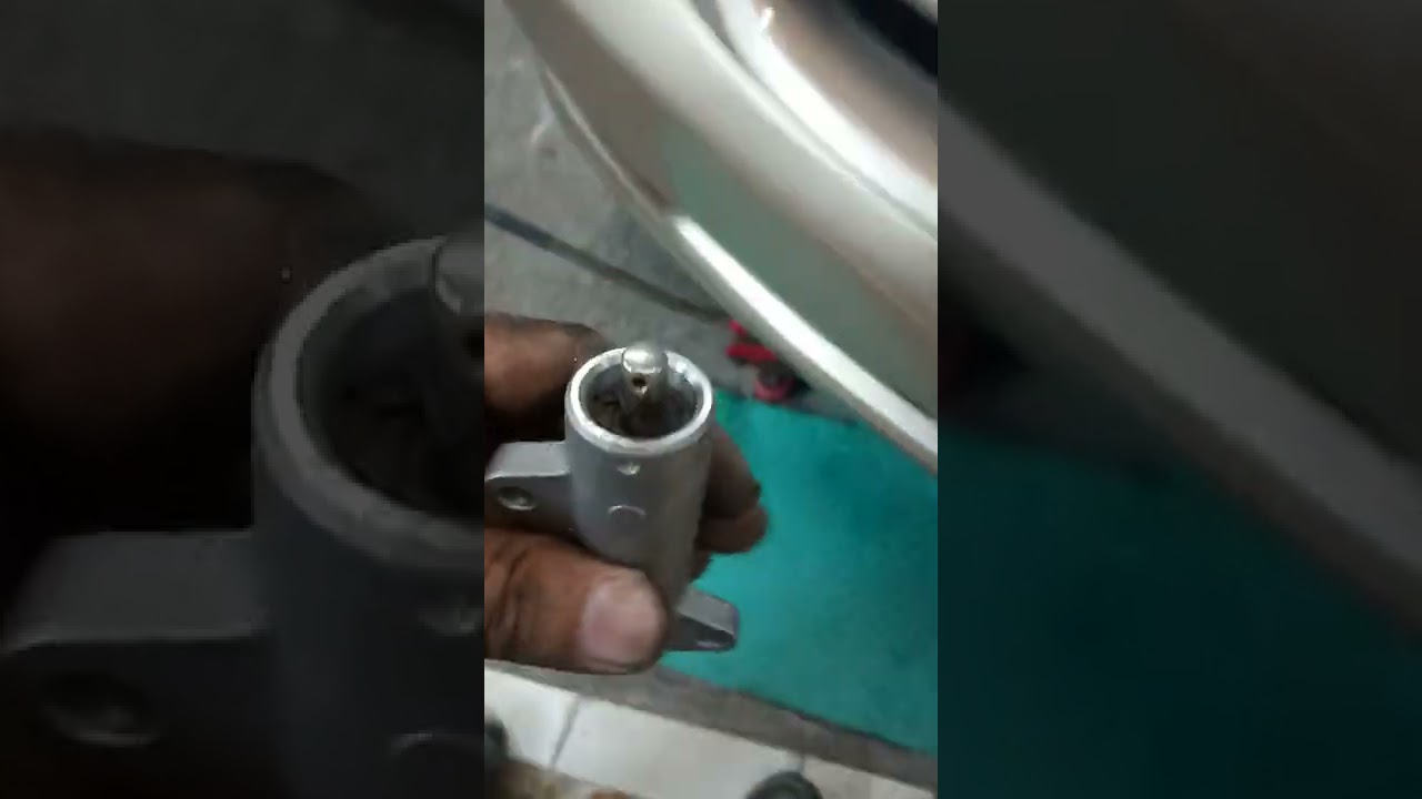 How to retract the piston rod of tension adjuster before reinstalling ...