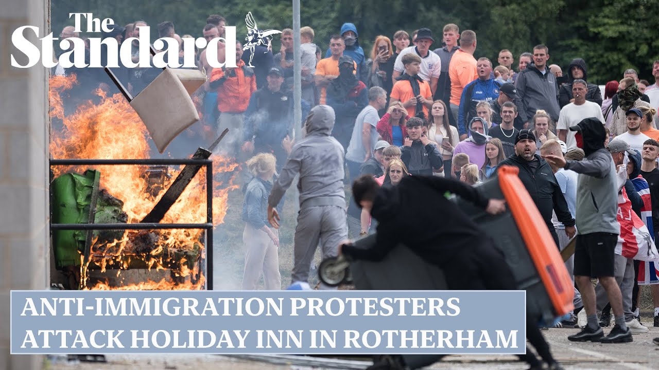 Anti-immigration protesters attack Holiday Inn hotel in Rotherham - YouTube