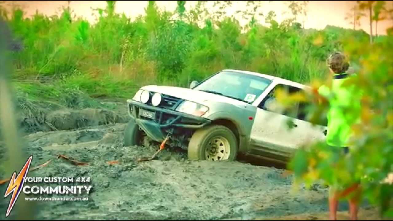 Nissan Patrol GU vs Pajero Offroad bogged Mud Recovery - YouTube