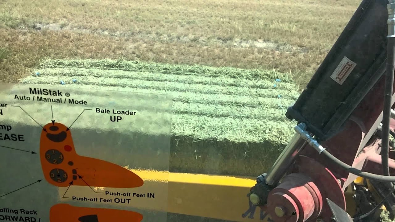 New Holland H9880 w/ Mil-stak - YouTube