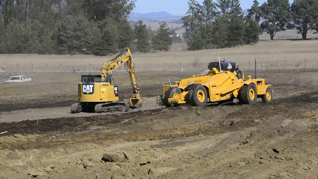 Glen Ghilotti on CAT 46A pushing Greg Shandel on CAT DW10 - YouTube