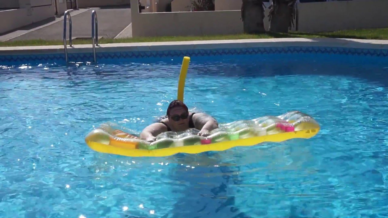Fat girl on a pool inflatable - YouTube