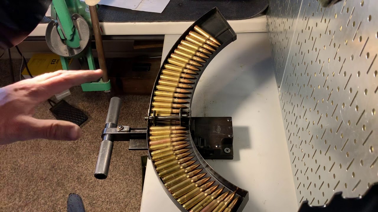 Loading 308 in a Finnish Maxim belt loader - YouTube