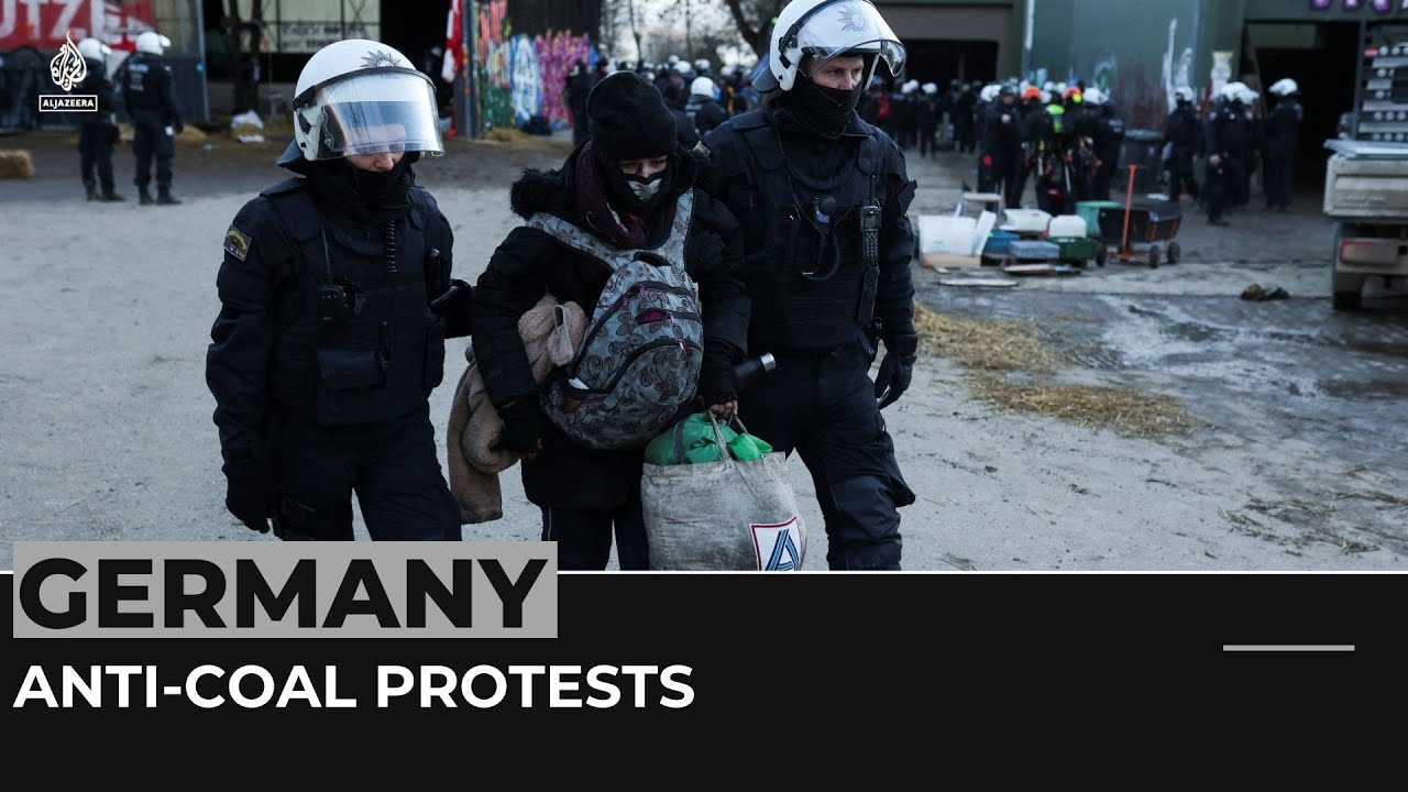 German coal mine standoff escalates as police move on protesters - YouTube