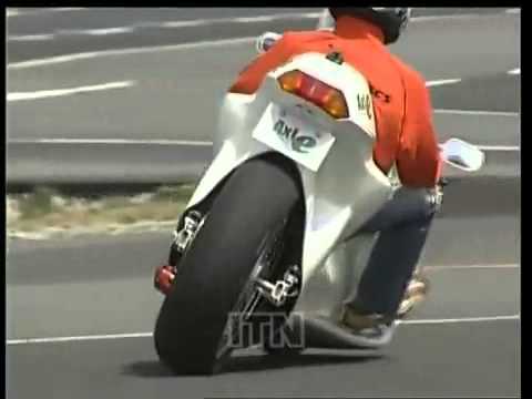 Magnetic hybrid motorbike unveiled in Japan - YouTube