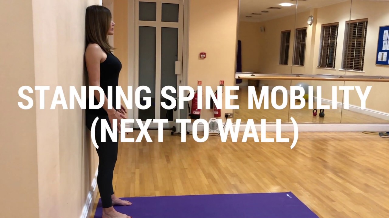 Standing Spine Mobility Next to Wall - Sarah Lasenby Pilates - YouTube