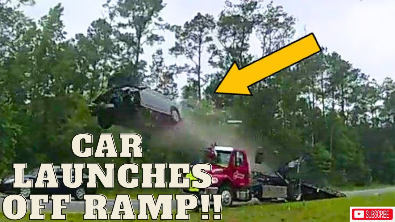 Car launches off tow truck ramp on Georgia highway!! - YouTube