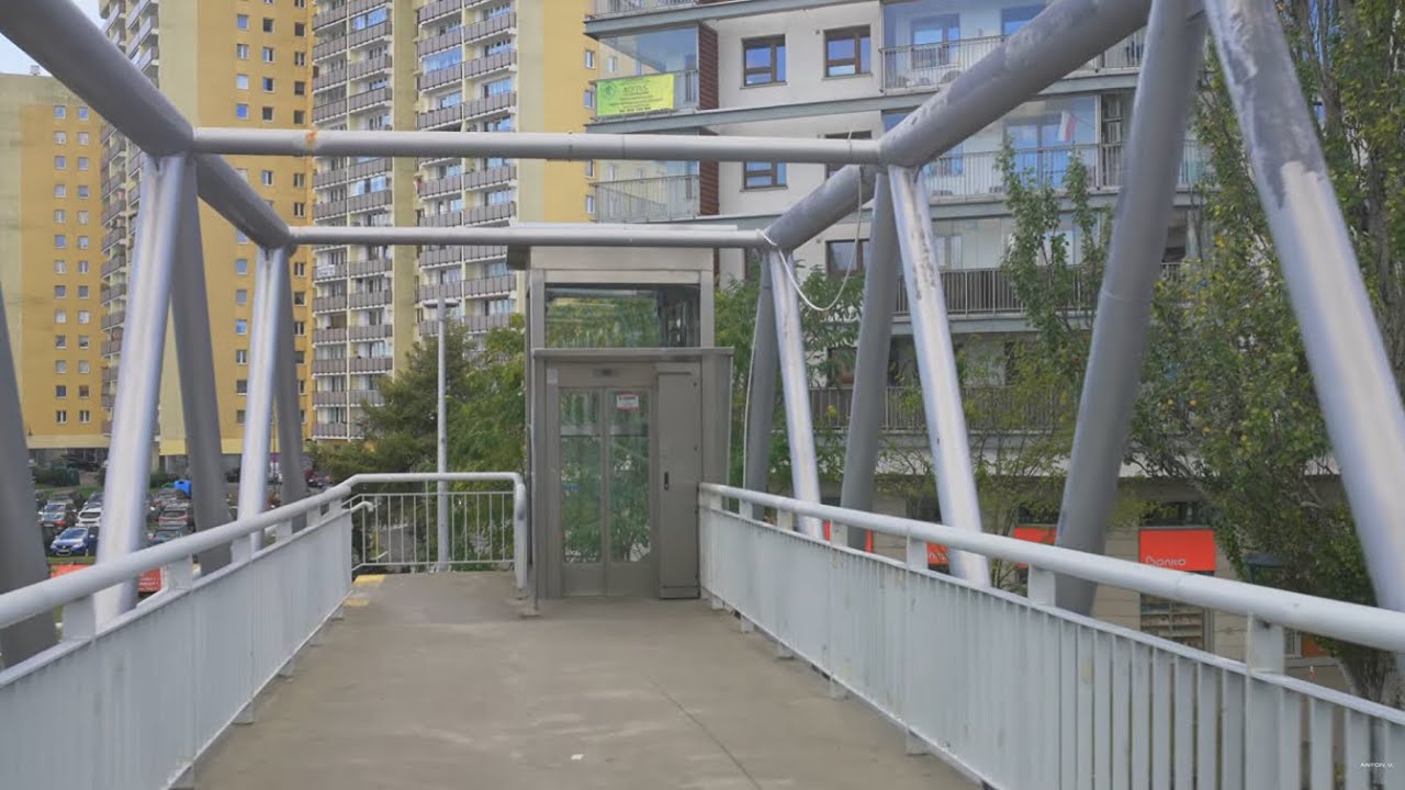 Poland, Warsaw, Czapelska tram stop overhead bridge, 2X elevator - YouTube