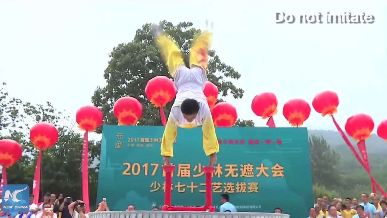 Two-finger handstand at Shaolin Temple in Henan, China - YouTube