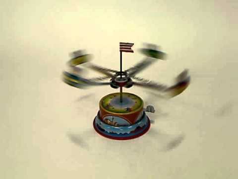 Tin Toy Carousel - Rocket Ride - YouTube