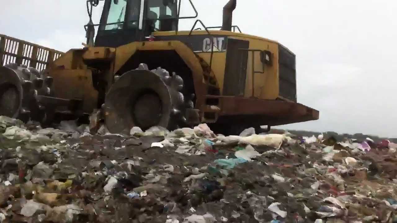 Hilo landfill and cat D8L bulldozer and cat compactor - YouTube