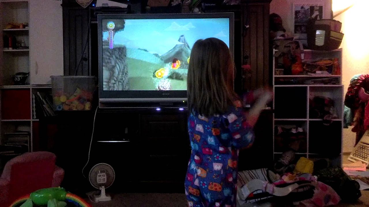 Chloe playing Dora game on WII - YouTube