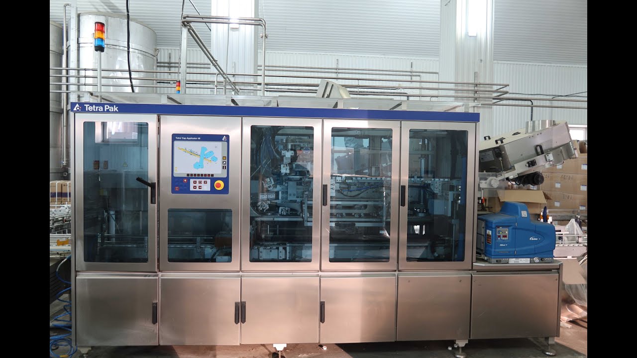 Аппликатор крышки Helicap 23 TCA 49 Tetra Pak - YouTube