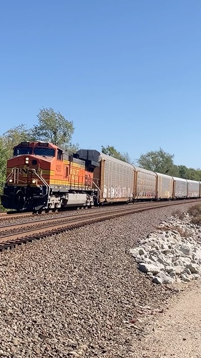 BNSF 4050 solo leading WB Autorack at Otis Indiana - YouTube