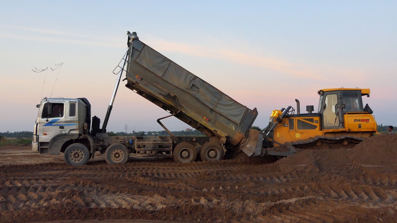 Bulldozer operator skill pushing sand & Heavy Dump truck moving soil ...