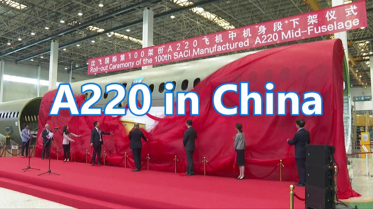 The mid-fuselage of the 100th Airbus A220 rolls off the assembly line ...