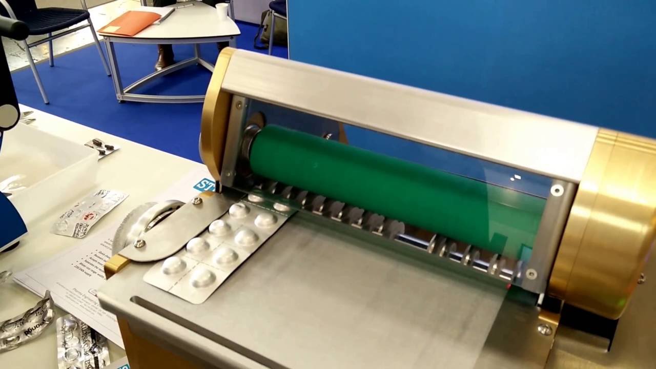 Stripfoil Moto deblistering at Expopharm - YouTube