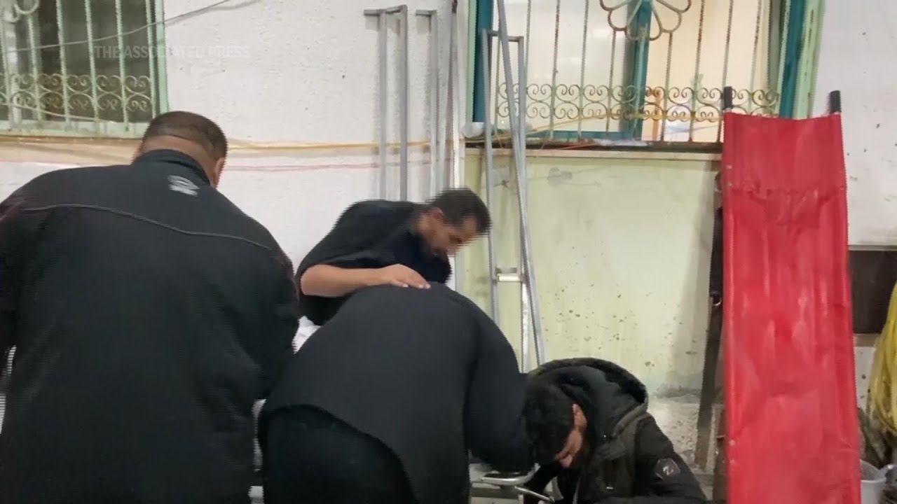 Victims of Gaza strikes brought to Rafah hospital - YouTube