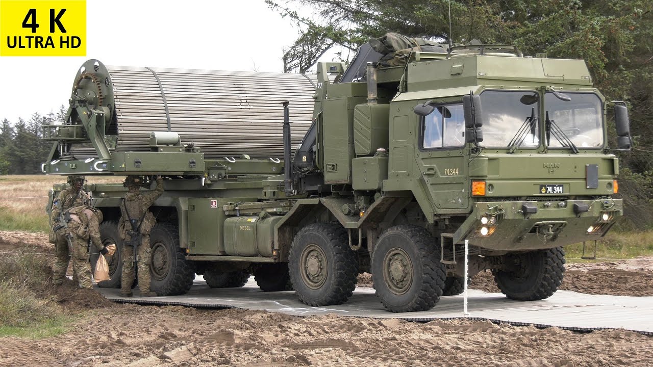 Danish Armed Forces Engineers lay FAUN Trackway Convoy crossing MOWAG ...