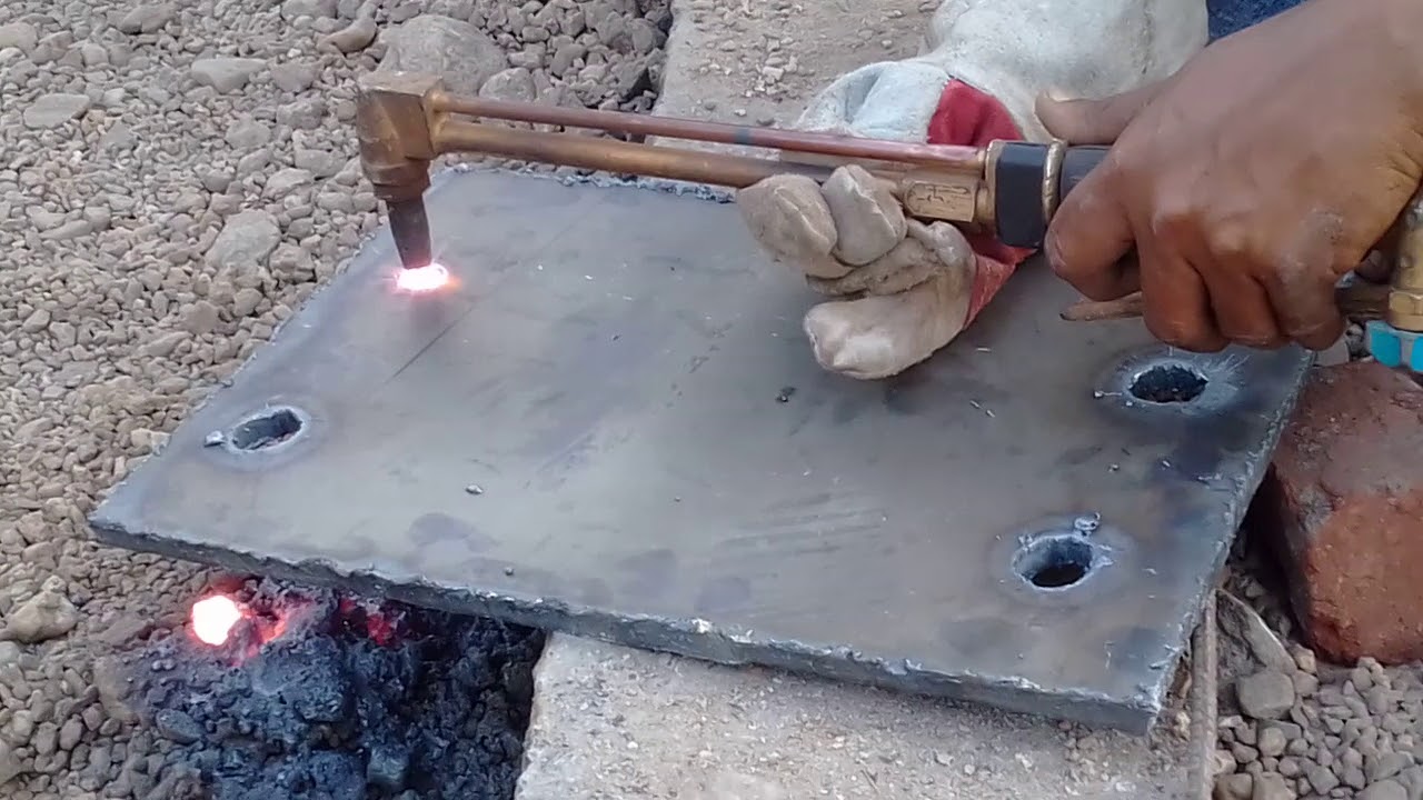 make a hol in sheet by gas cutter - YouTube