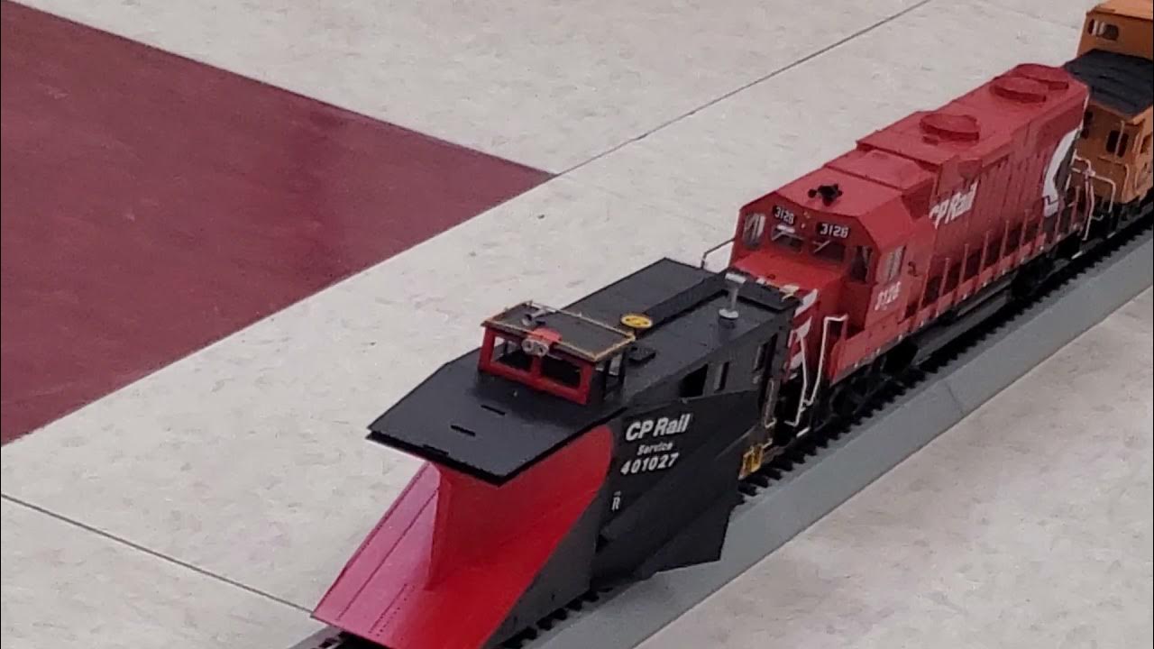 HO Scale Walthers' Proto, Russell Snow Plow and Bachmann DCC GP38-2 with caboose. - YouTube