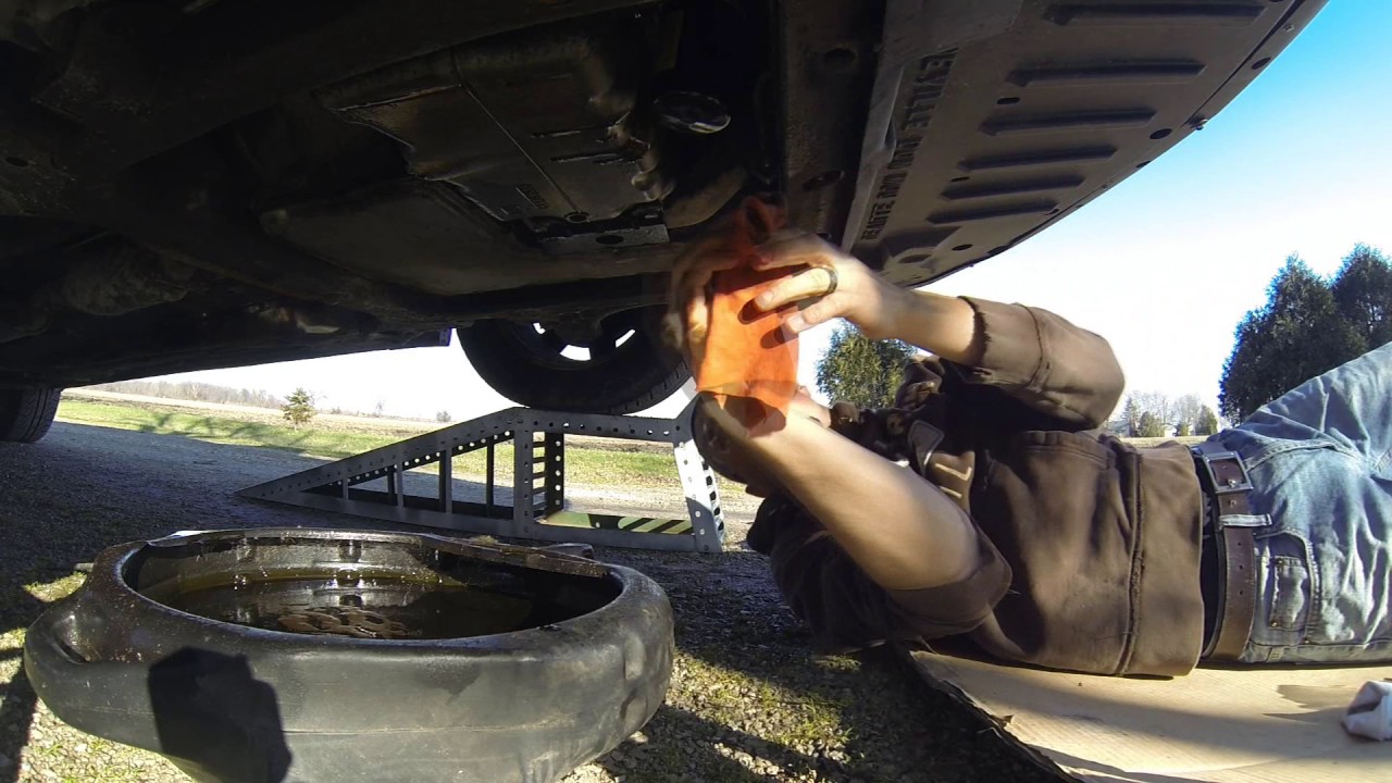 Rotten Caddy Oil Change - YouTube