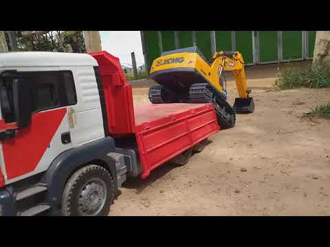 Excavator XCMC Loading dump truck Man TGS HD 720p