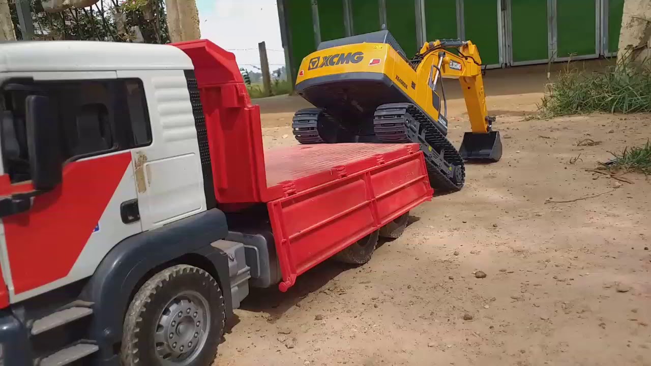 Excavator XCMC Loading dump truck Man TGS HD 720p - YouTube