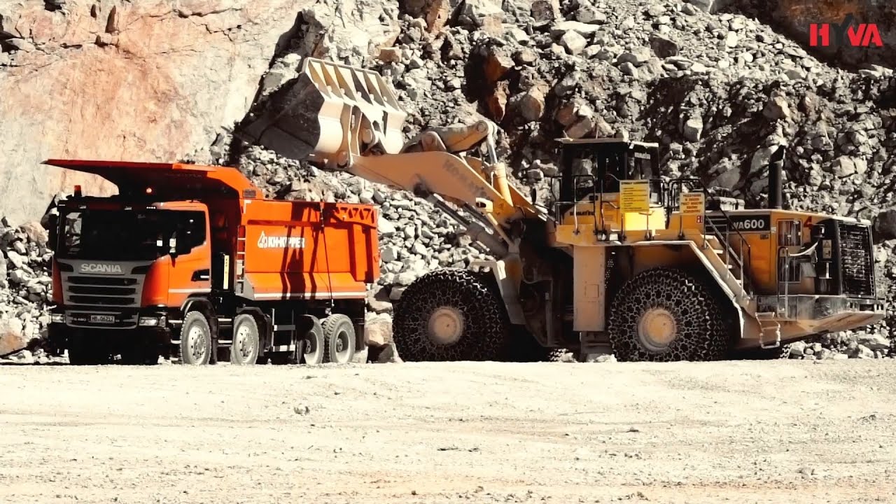 Scania 8x4 mining tipper in hard work - YouTube