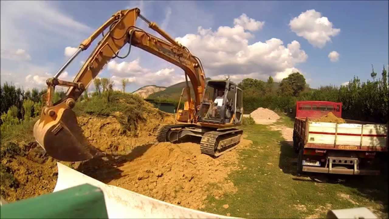 Escavatore Case 9013 in azione - YouTube